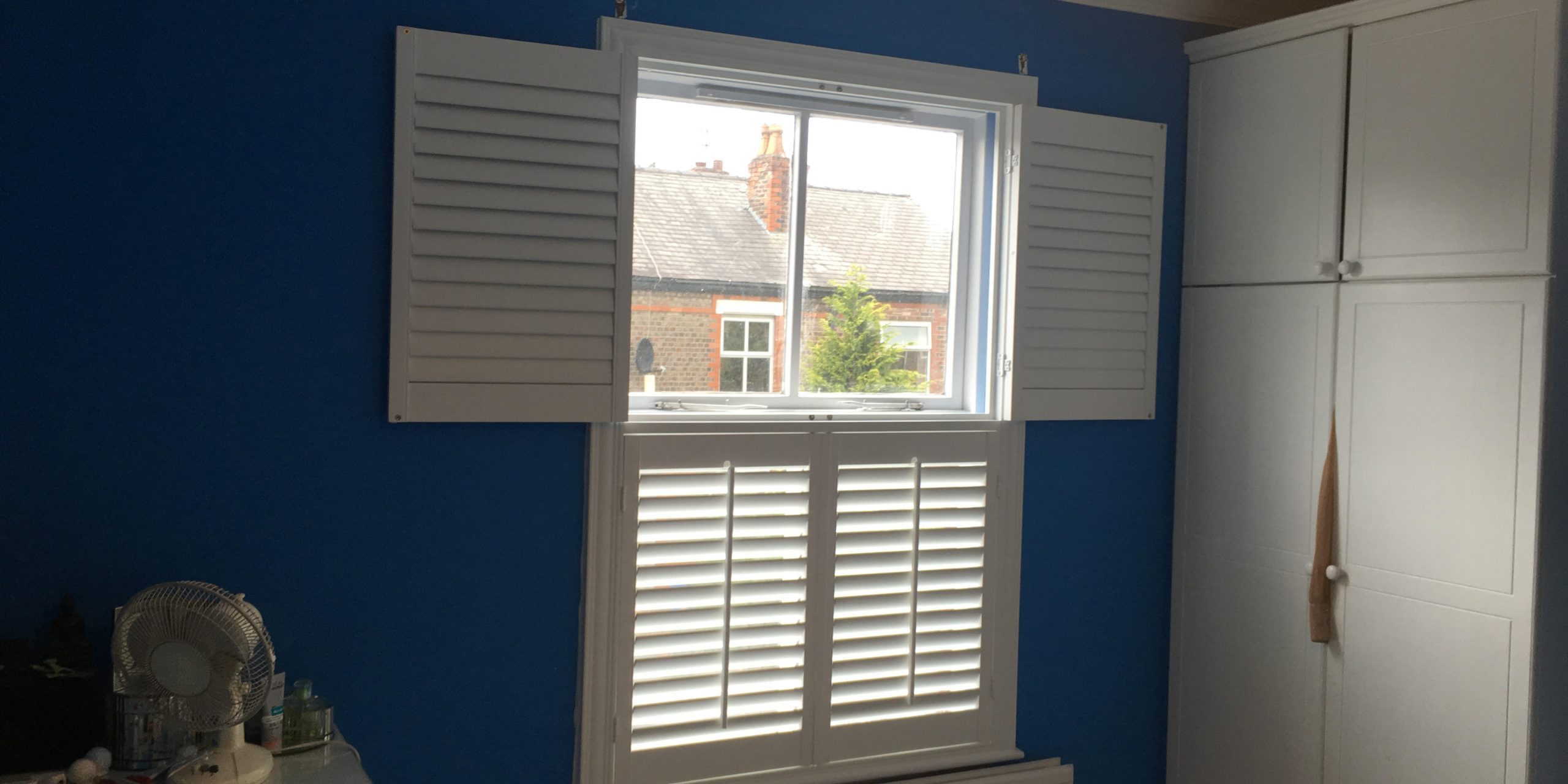 Bright White Tier on Tier Plantation Shutters Altrincham | Absolute Shutters